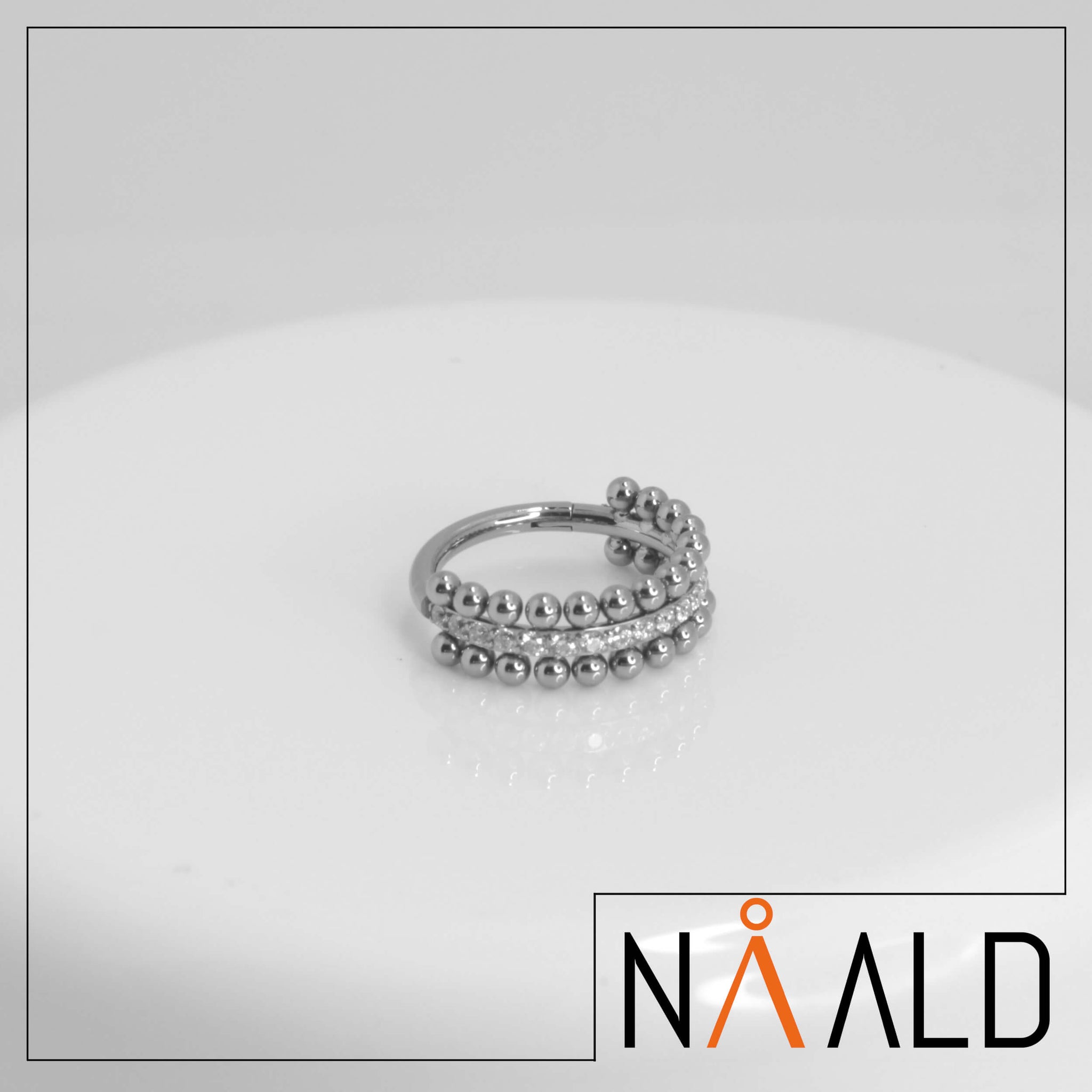 Piercing : Acier chirurgical ou titane ? Faites le bon choix ! – Nåald