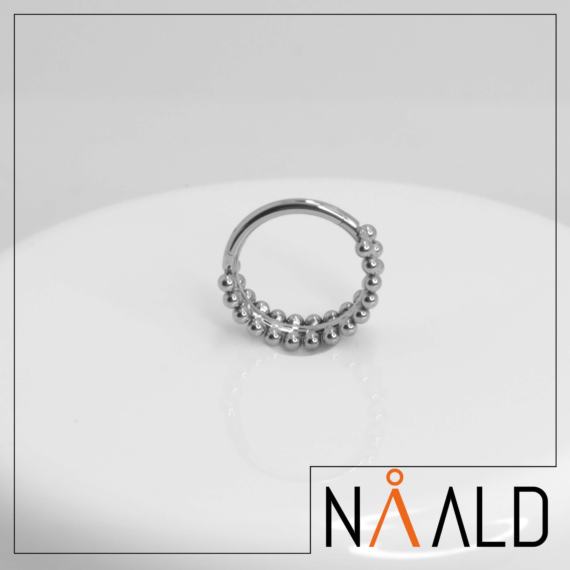 Piercing : Acier chirurgical ou titane ? Faites le bon choix ! – Nåald